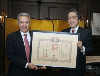 Conferment of the Order of the Rising Sun, Gold Rays with Neck Ribbon on Professor David E ...